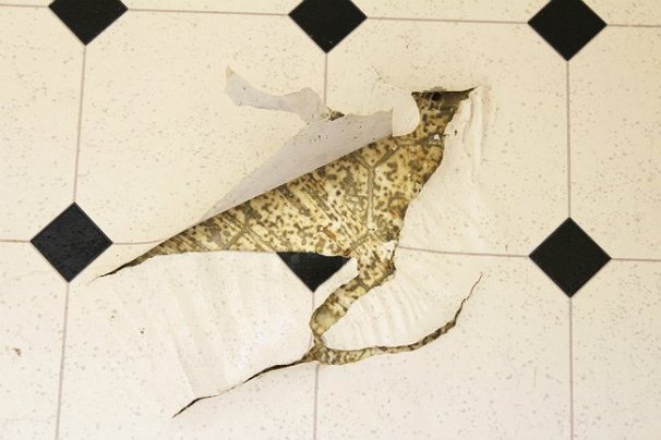 How to Repair Torn Vinyl Flooring - Bob Vila Radio - Bob Vila