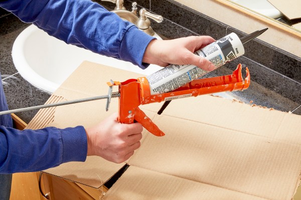 How to Use a Caulk Gun the Right Way - Bob Vila