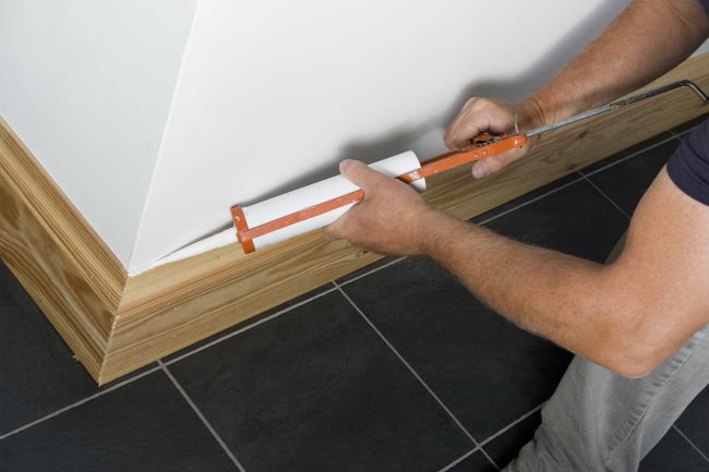 How to Caulk Baseboards - Bob Vila