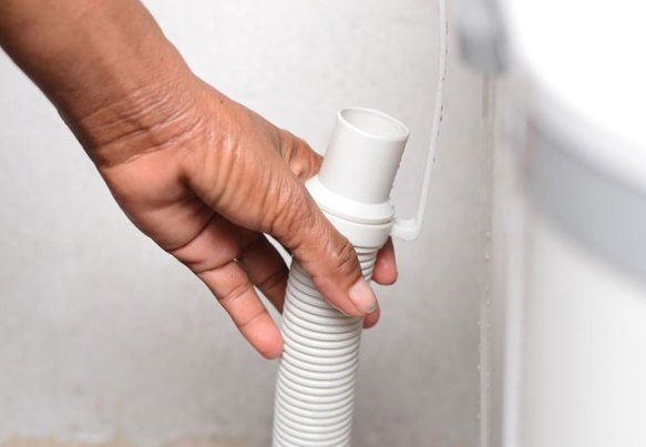 How to Drain a Washing Machine (Project Guide) - Bob Vila