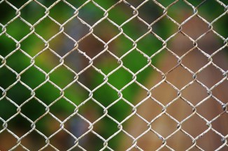 Chain Link Fence Cost Guide: Buying & Installing - Bob Vila
