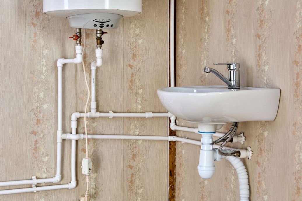 Tank vs. Tankless Water Heater Cost: 8 Factors to Consider When Choosing a Water Heater - Bob Vila