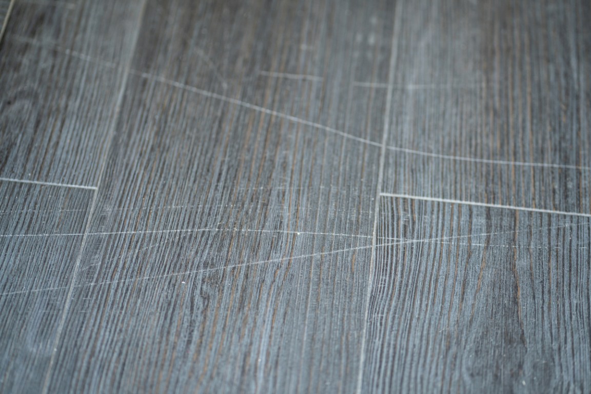 How to Repair Laminate Flooring: 5 Problems, Solved