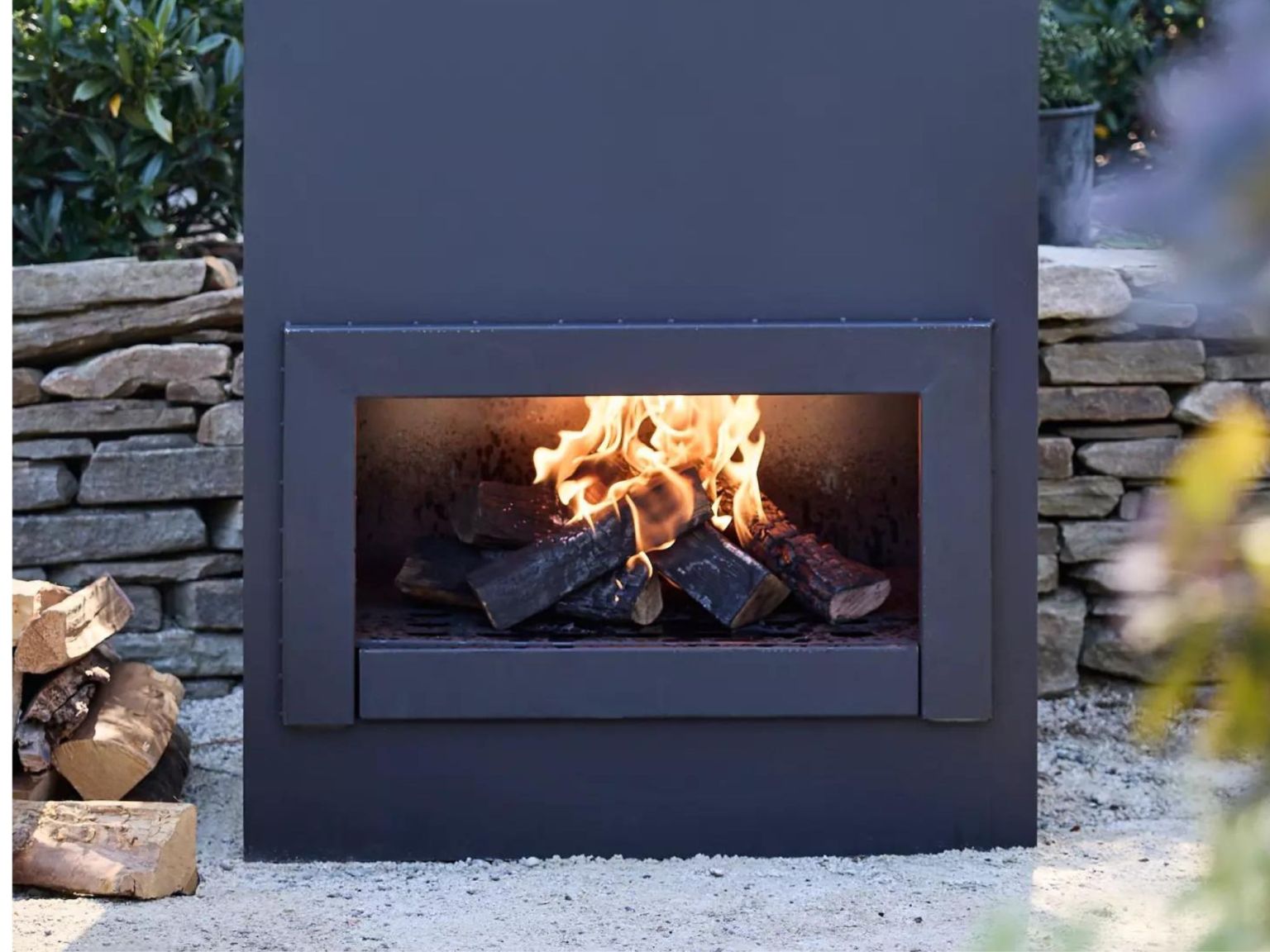 These Outdoor Fireplaces Will Make Your Space Warm and Cozy