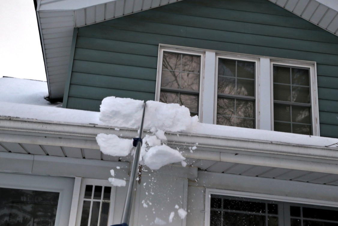 Why You Should Never Knock Down Icicles Yourself—and What to Do Instead
